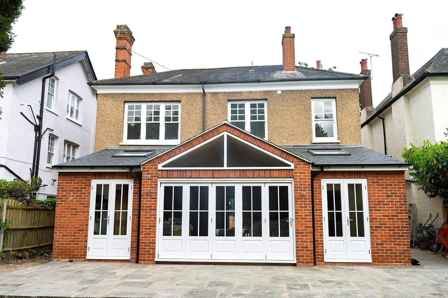 Timber bifold doors and matching French doors installation in Enfield